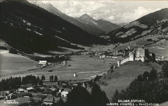 AK / Ansichtskarte Sillian Tirol Panorama Durchblick vom Waldrand aus ...
