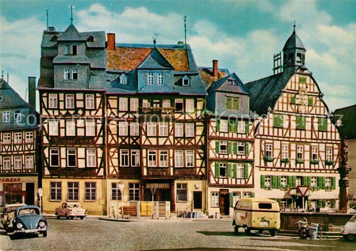 AK / Ansichtskarte Butzbach Marktplatz Strassencafes Brunnen ...