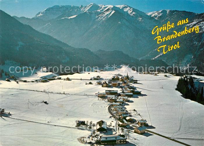 AK / Ansichtskarte Brandenberg_Tirol Gebirgsdorf Winterlandschaft mit ...